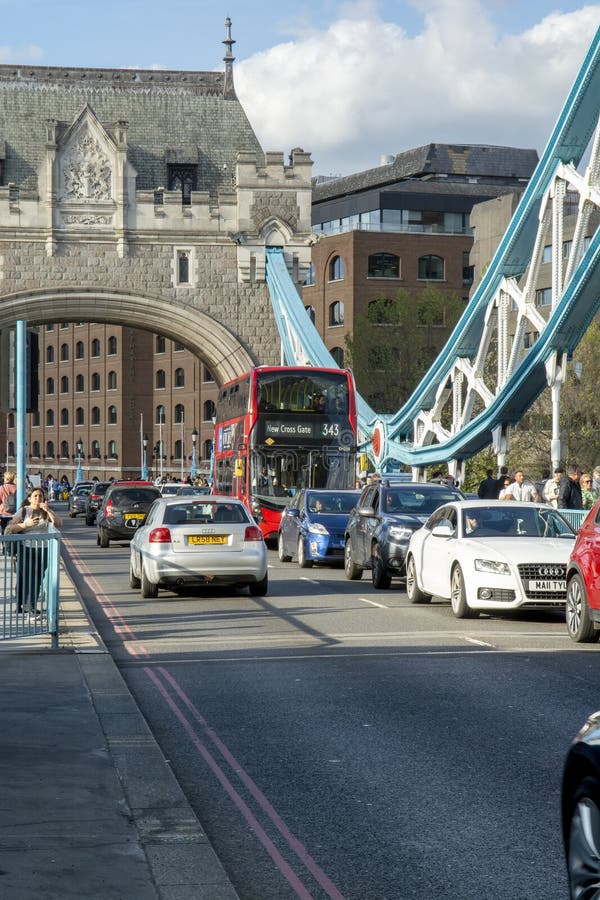 People Walking on Tower Bridge in London. the Tower Bridge Was Built ...