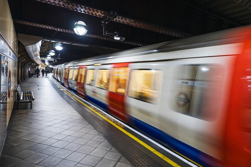 London Underground Train Arriving at Station Platform with Motion Blur ...