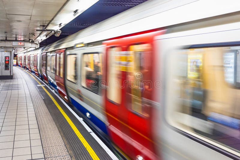 London Underground Train in Motion at Platform during Arrival Stock ...