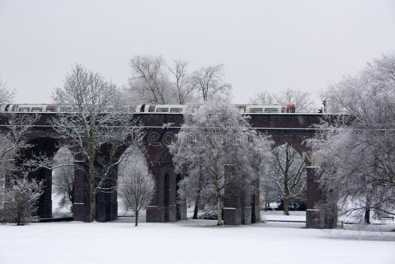 London Underground Tube Train on Bridge Stock Photo - Image of commute ...