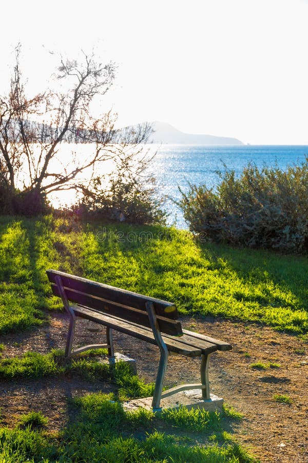 Lone Bench on a Cliff Facing the Sea Stock Image - Image of point ...