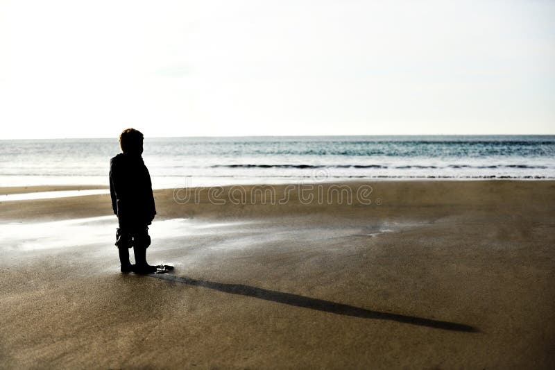 Lone Child on a Beach before Sunset Stock Image - Image of silhouette ...