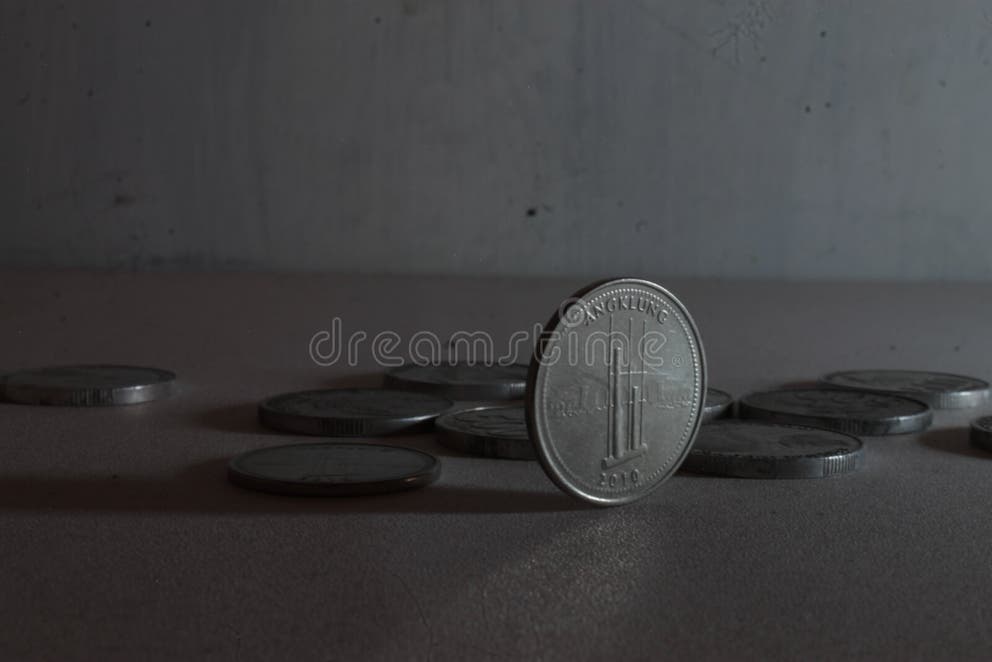 Coins in shadow stock photo. Image of furniture, light - 202873838