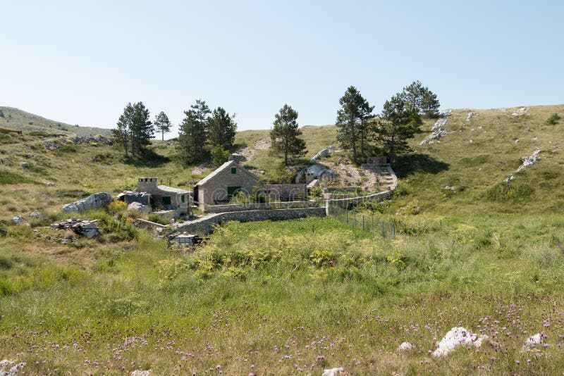 A Lone House on a Mountainside Stock Photo - Image of hill, scenery ...