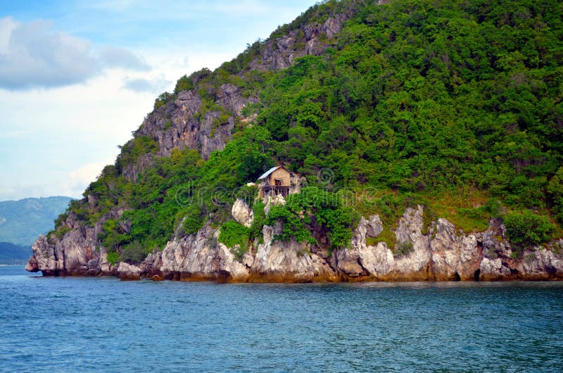 Lone island in ocean stock photo. Image of paradise, ocean - 69800596