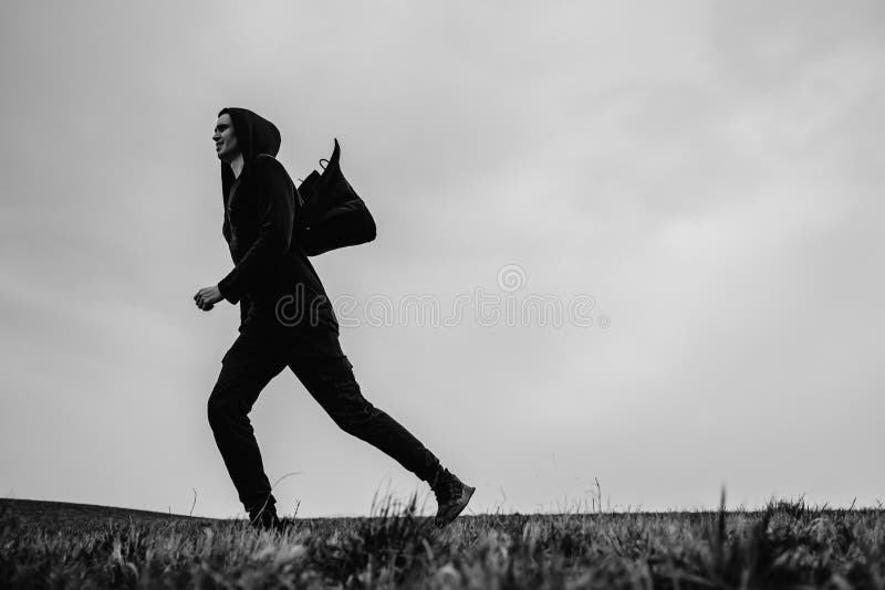 A lone man runs stock photo. Image of lonely, look, hike - 179210756