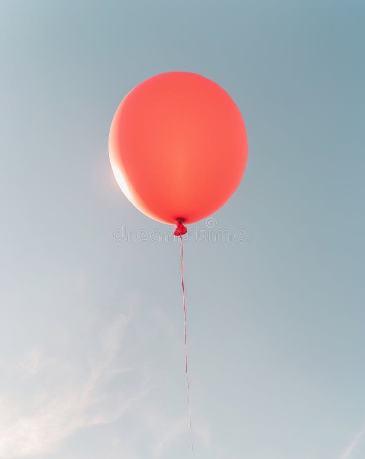 Lone Red Balloon Floating in Pale Blue Sky Stock Image - Image of vivid ...