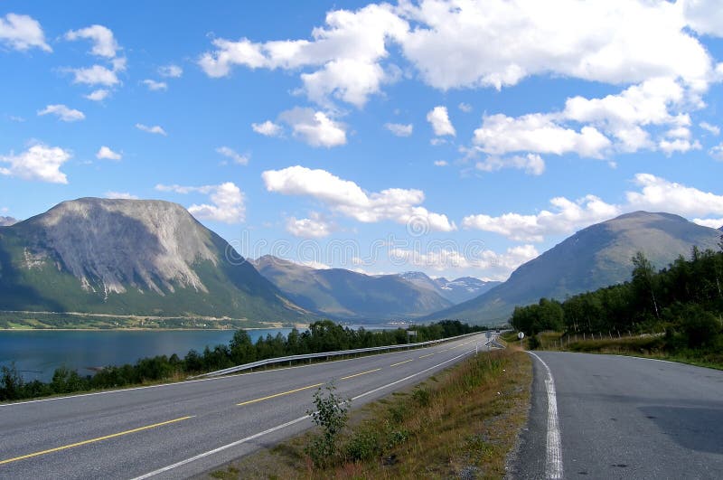 Lone road stock photo. Image of blue, line, mountains - 3117008