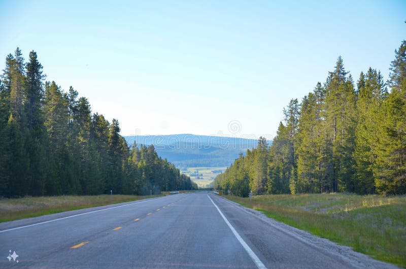 Lone Road in Big Sky Montana with Mountains Stock Photo - Image of lone ...