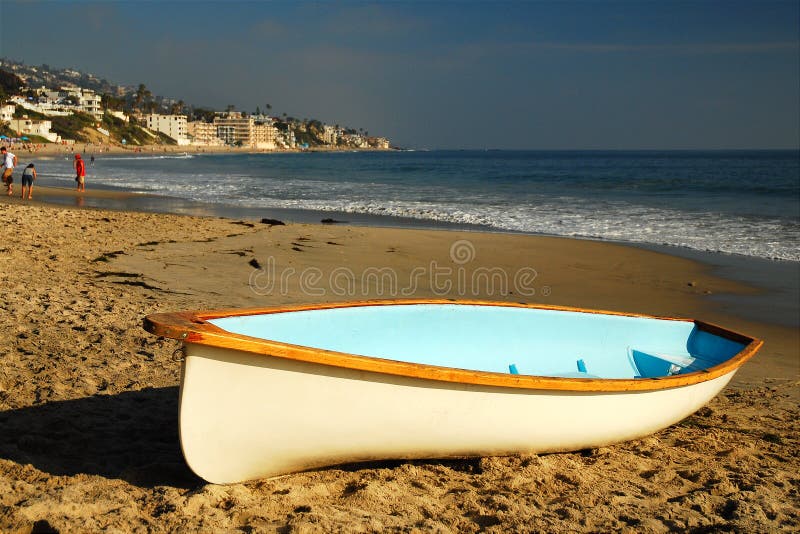 Lone Row boat at the beach stock image. Image of life - 83441909