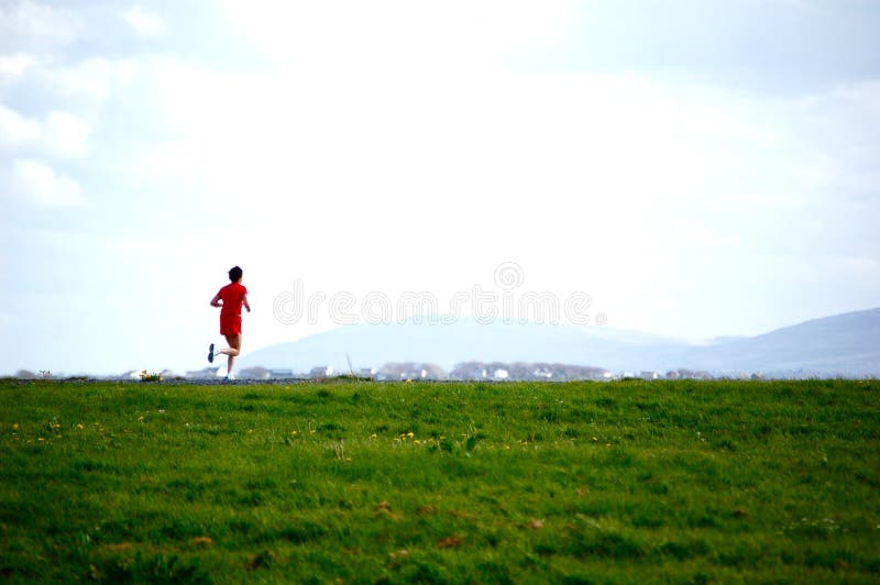 A lone runner stock image. Image of exercise, determination - 5073959