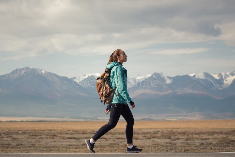 Lonely Backpacker Girl is Trekking in Mountains Stock Photo - Image of ...
