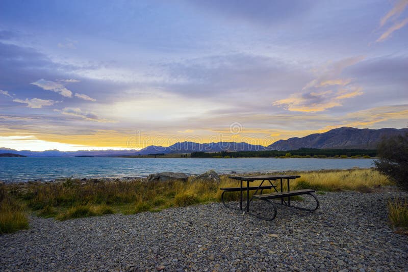Lonely Bench with Beautiful Sunset Landscape at Background. Stock Photo ...
