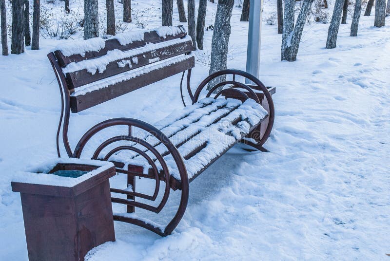 Lonely bench in winter stock photo. Image of bench, snow - 165115252