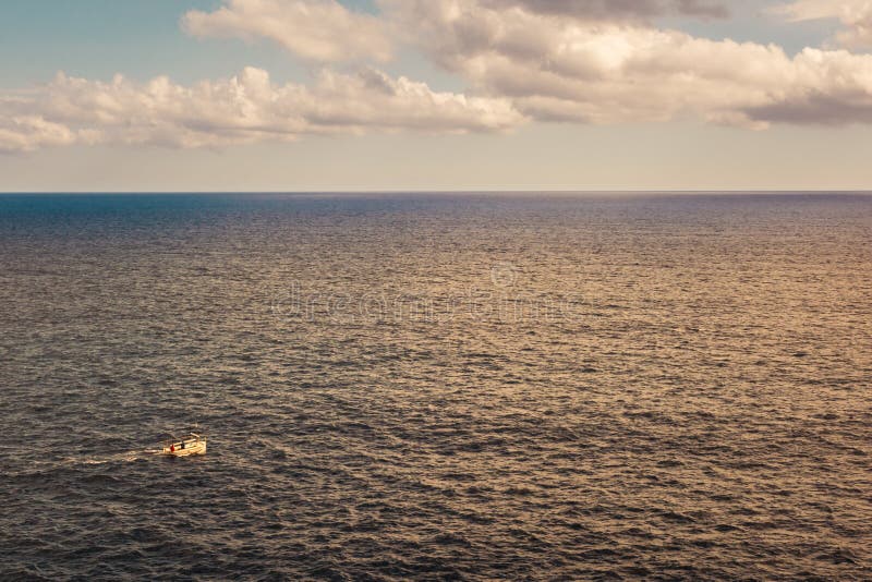 Lonely Boat Floating Out Open Ocean Stock Photos - Free & Royalty-Free ...