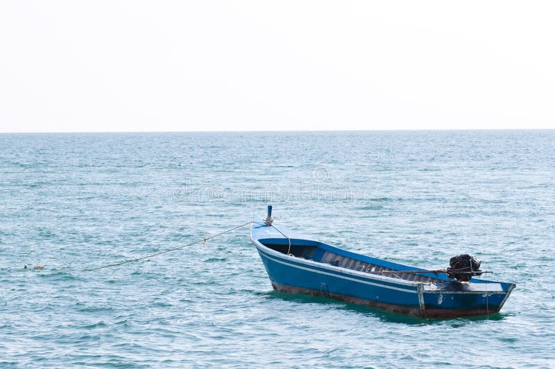 Lonely boat in the ocean stock image. Image of explore - 14600415