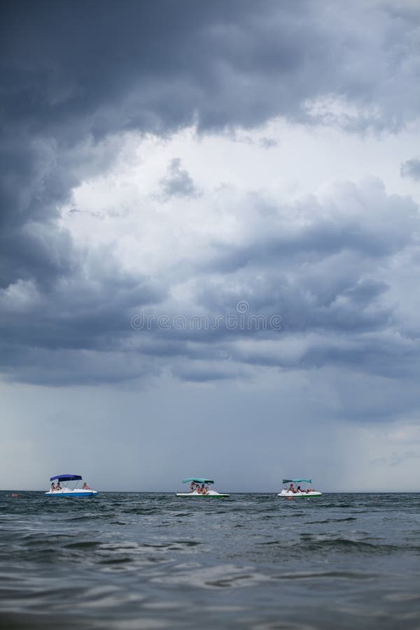 Lonely Boat in the Open Sea, Bad Weather, a Sense of Danger Stock Image ...