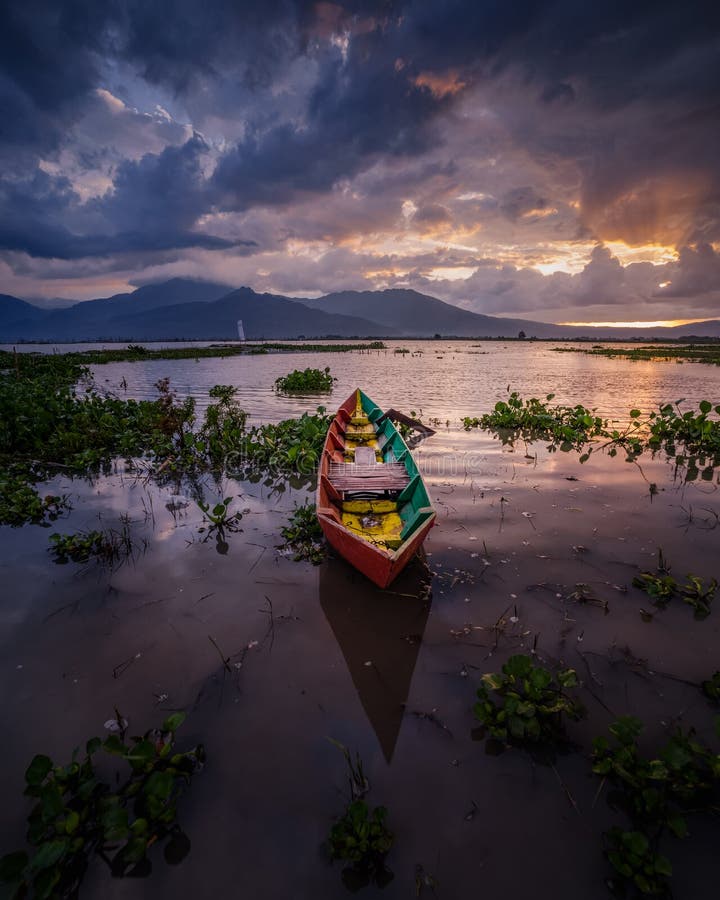 Lonely boat stock image. Image of morning, horizon, shore - 267762011
