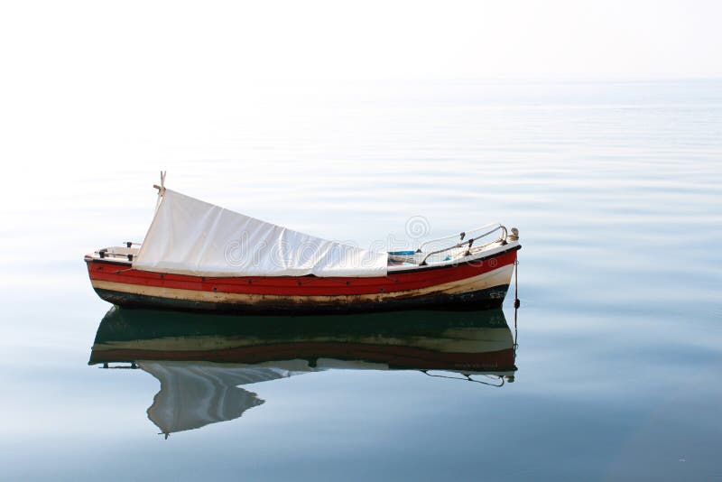 Lonely Boat in the Sea stock image. Image of horizontal - 28793505