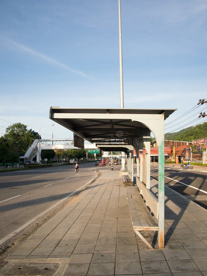 Lonely Man at a Bus Stop Waiting for Public Transport Stock Image ...