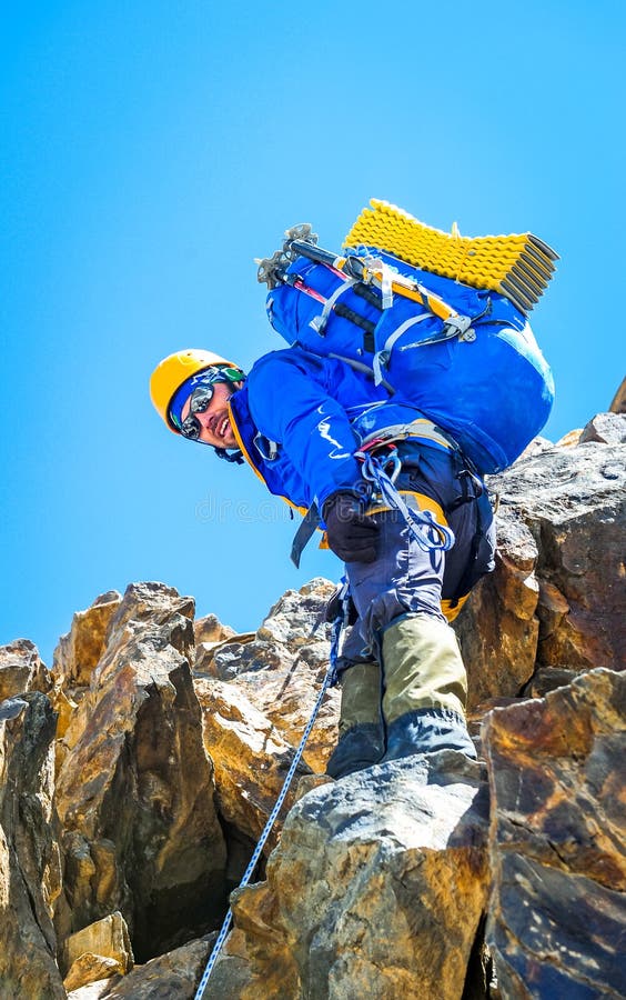 A Lonely Climber Reaching the Summit Stock Image - Image of blue, snow ...