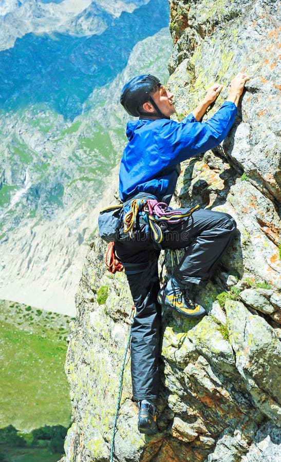 A Lonely Climber Reaching the Summit Stock Photo - Image of height ...