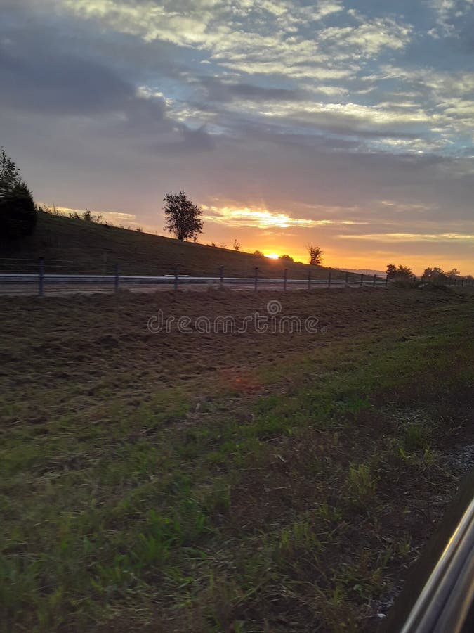 Lonely country sunset stock image. Image of water, light - 236110463