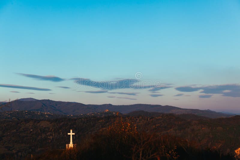 Lonely cross lighted stock photo. Image of christian - 60587150