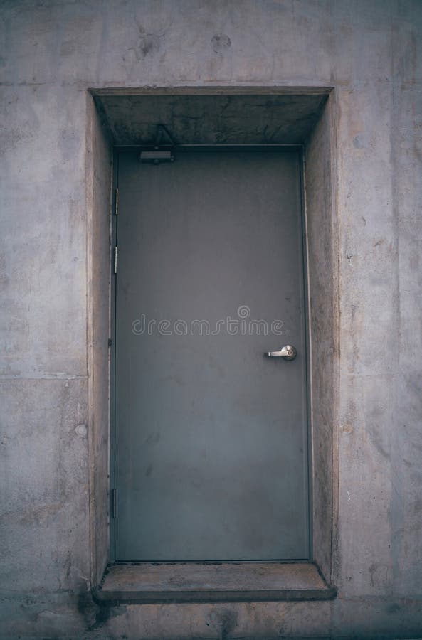Lonely Door Deep Inside a Massive Concrete Wall Stock Image - Image of ...