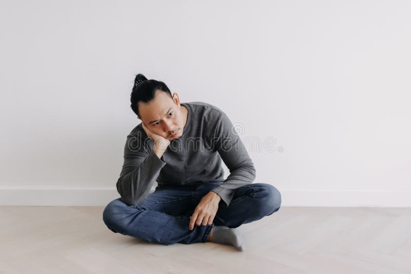 Lonely Freelance Creative Man Sitting Alone in Empty White Room. Stock ...