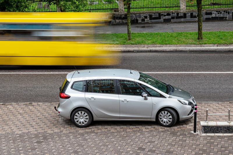 Lonely Gray Car on the Side of the Road. Car Parked on the Street Stock ...