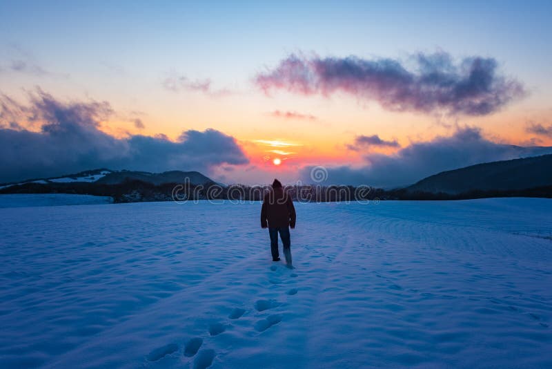 Lonely Man Sunset Winter Snowy Field Stock Photos - Free & Royalty-Free ...