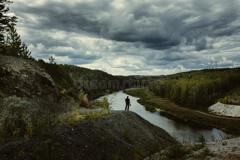 Lonely Man Looking Away Standing Near Cliff Edge Stock Image - Image of ...