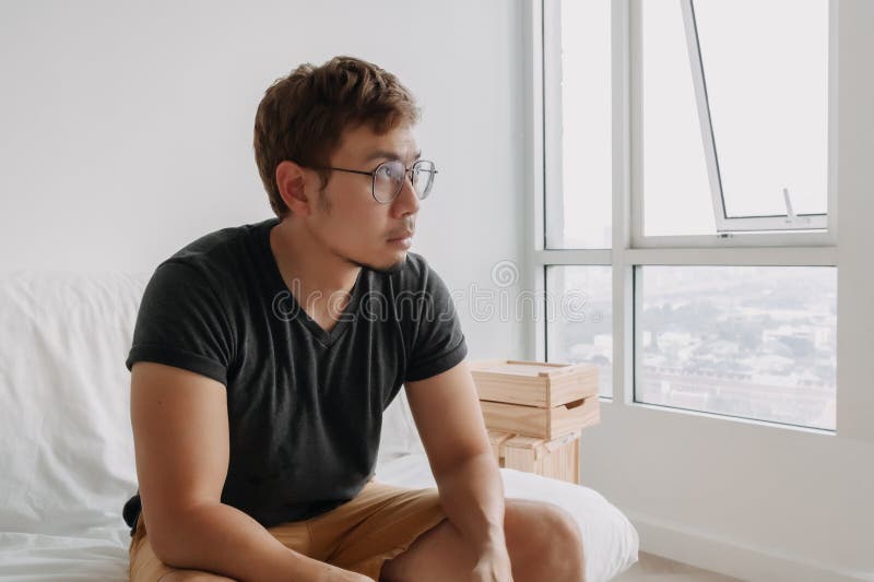 Lonely Man Sitting Lonely in His Apartment. Concept of Depression ...