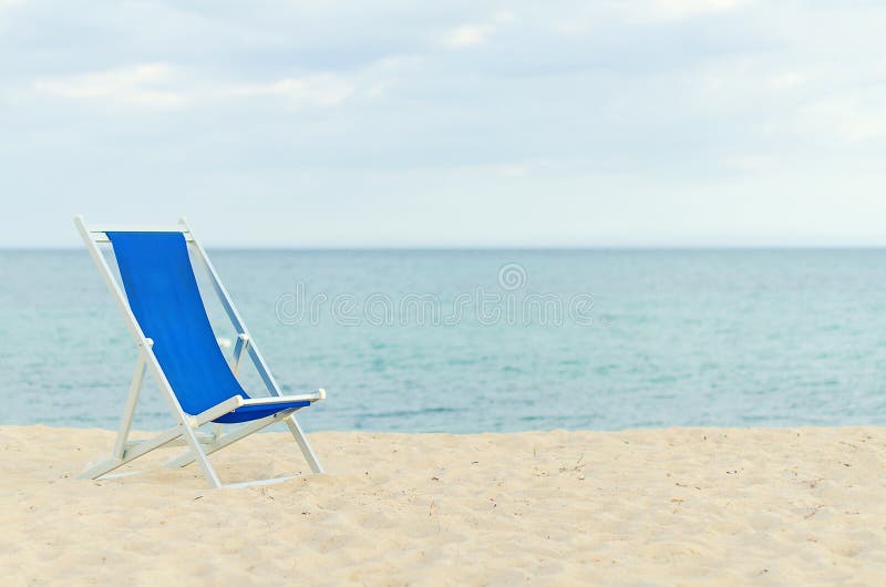 Lonely Metal-framed Deckchair Stock Photo - Image of cloud, holiday ...