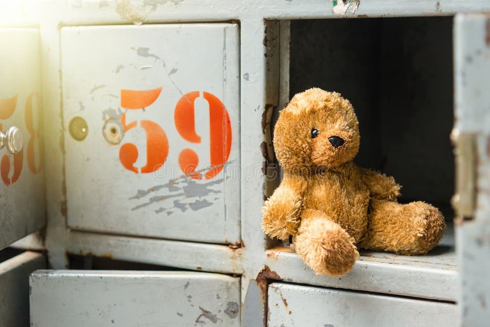 Lonely Old Teddy Bear is Sitting in the Locker. Stock Photo - Image of ...