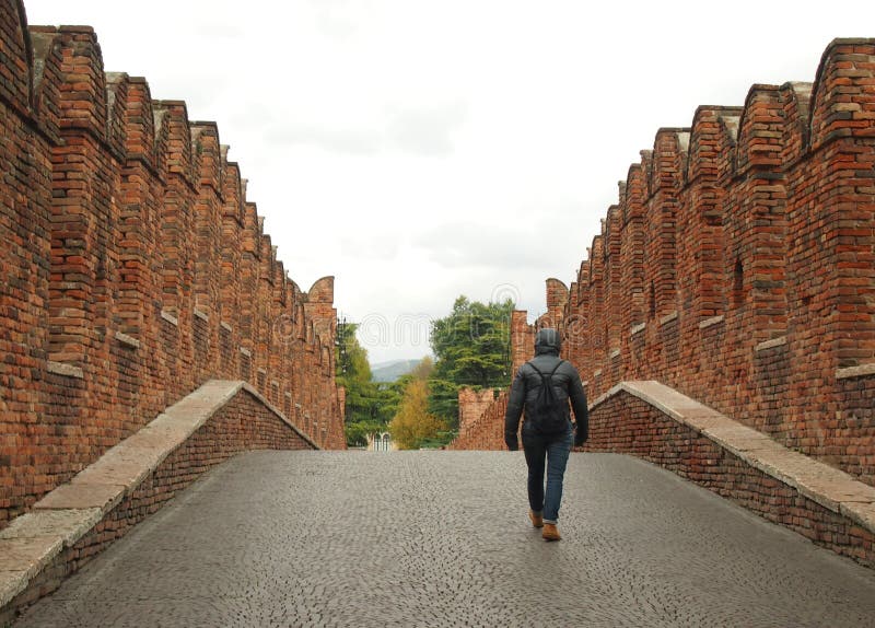Lonely Person Crossing a Medieval Bridge Stock Image - Image of adagio ...