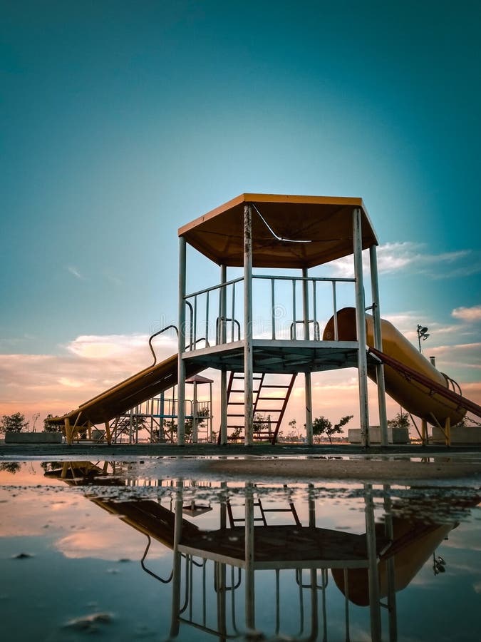 Lonely Playground Just Waiting Stock Photo - Image of water, vehicle ...