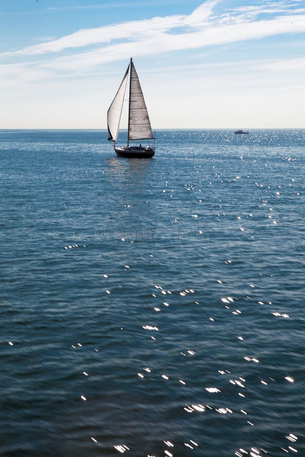 Lonely Sail Boat on the Sea Stock Image - Image of landmarks, cityscape ...