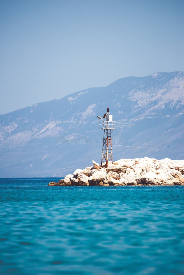 Lonely Sea Beacon on Rocky Shore Stock Image - Image of mountain ...
