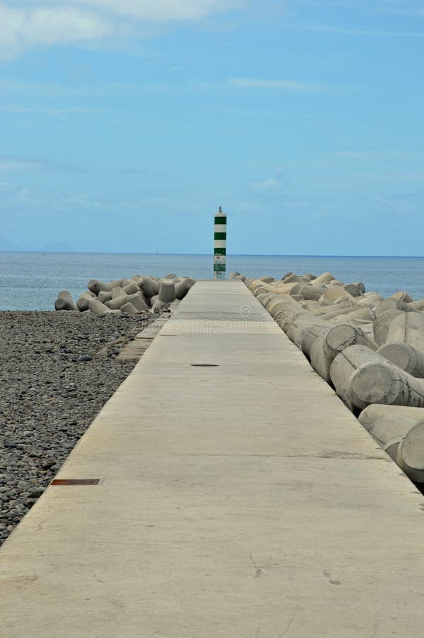 A lonely shore beacon stock image. Image of ocean, beach - 95792157
