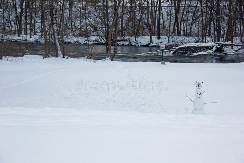Lonely Snowman in a Cold Park Stock Image - Image of michigan, apple ...