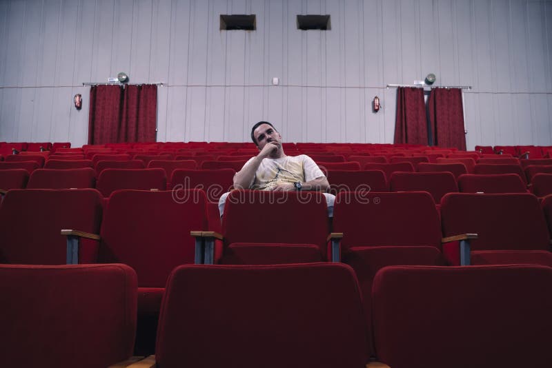 Lonely Spectator in an Empty Theater Attentively Watches the Play Stock ...