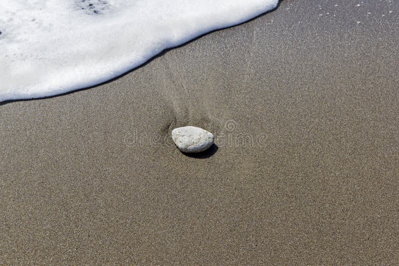 A Lonely Stone on the Sand in the Surf. Stock Photo - Image of nature ...