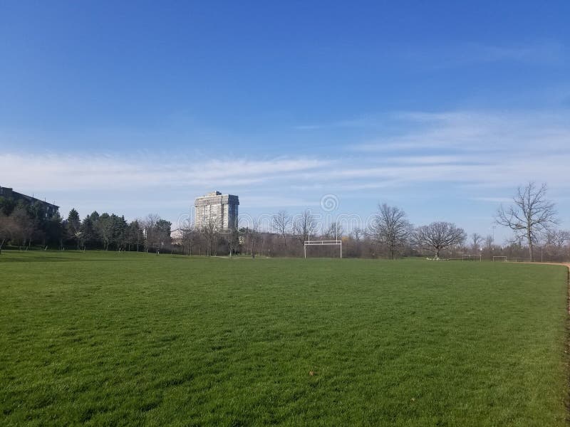 Lonely Tall Building in the Distance Stock Photo - Image of grass, farm ...