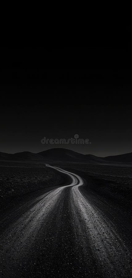 Lonely Winding Road through a Moody Desert Landscape at Night with ...