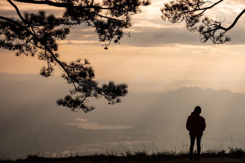 Sad Girl Standing On Cliff