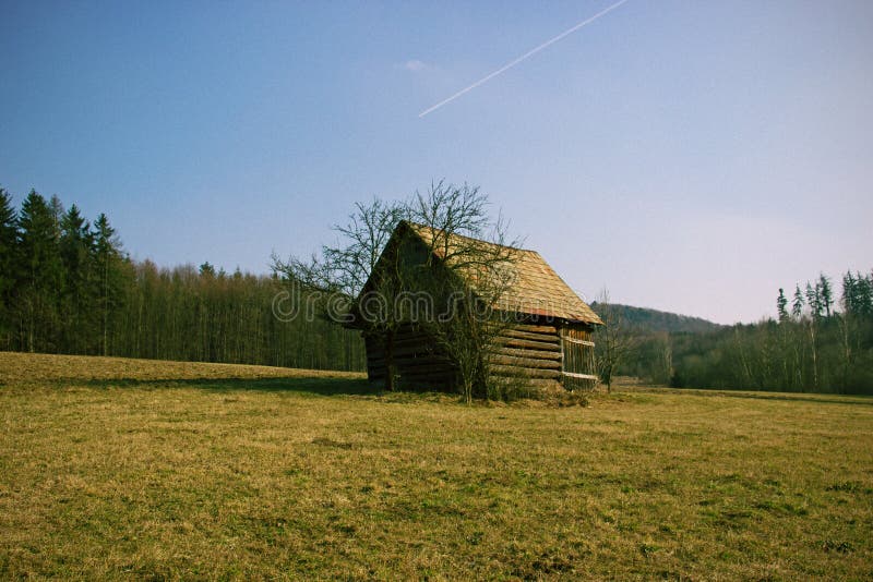 Lonely Wooden Cottage stock image. Image of landscape - 51957219