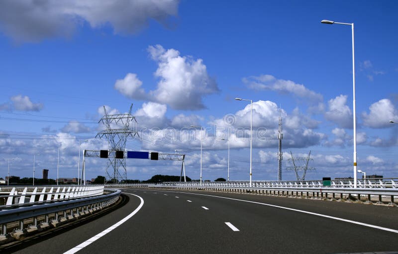 Image of an Empty Freeway Under a Bright Blue Sky. Stock Photo - Image ...