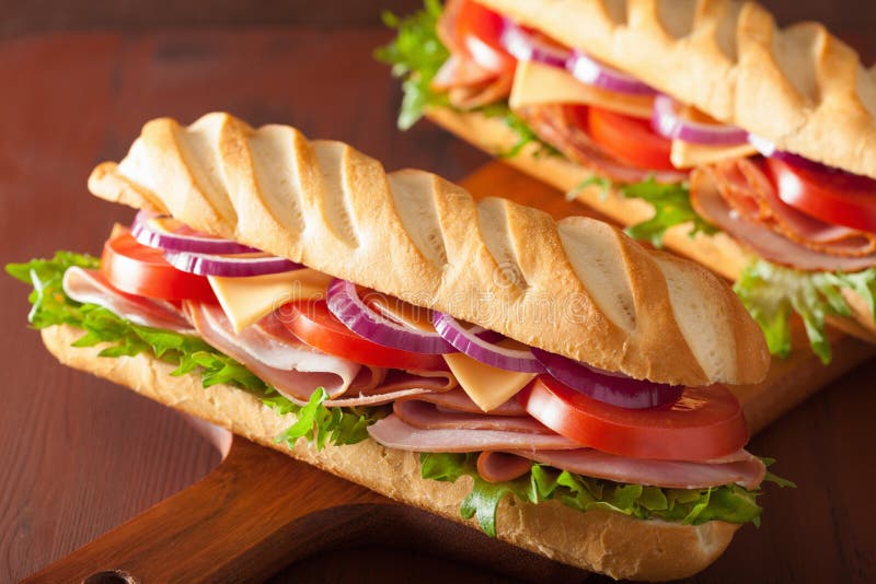 Long Baguette Sandwich with Ham Cheese Tomato Lettuce Stock Image ...